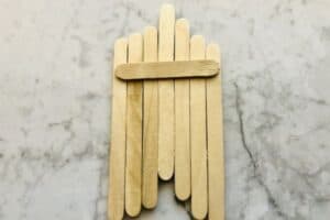 Easy DIY Popsicle Stick Sled Ornament Craft | Mombrite