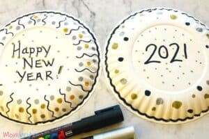 Paper Plate New Year’s Noisemaker Craft | Mombrite