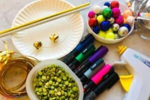 Paper Plate New Year’s Noisemaker Craft | Mombrite