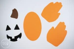 Pumpkin Handprint Craft for Halloween [Free Template] | Mombrite