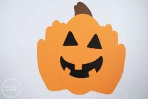 Pumpkin Handprint Craft for Halloween [Free Template] | Mombrite